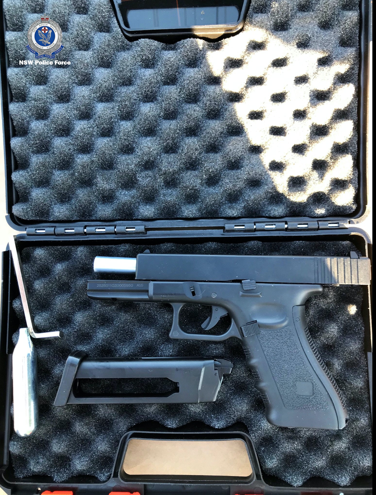 Rebels MC associate charged after rifle, handgun, replica firearms and ...