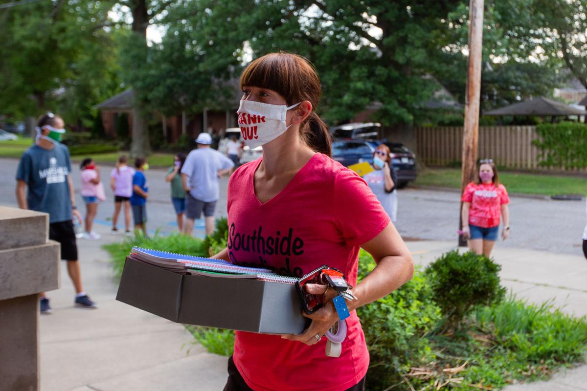 Pagans MC does drive-by drop-off of needed school supplies - Biker News
